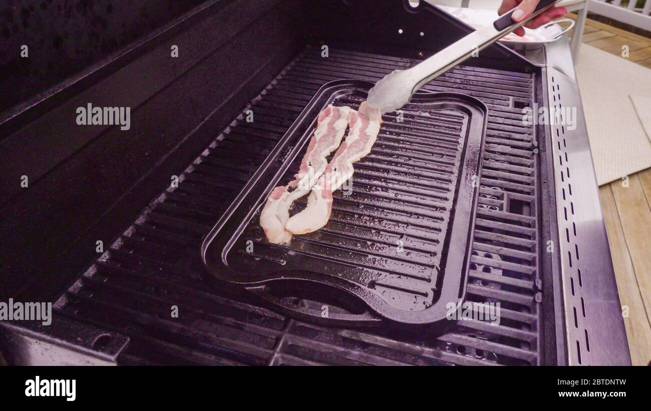 Cooking bacon stips on hi-res stock photography and images - Alamy