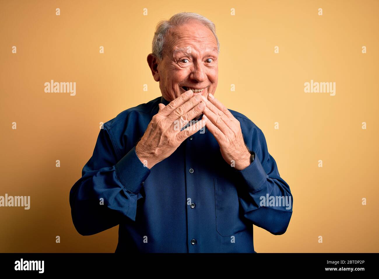 Senior man laughing embarrassed giggle hi-res stock photography and ...