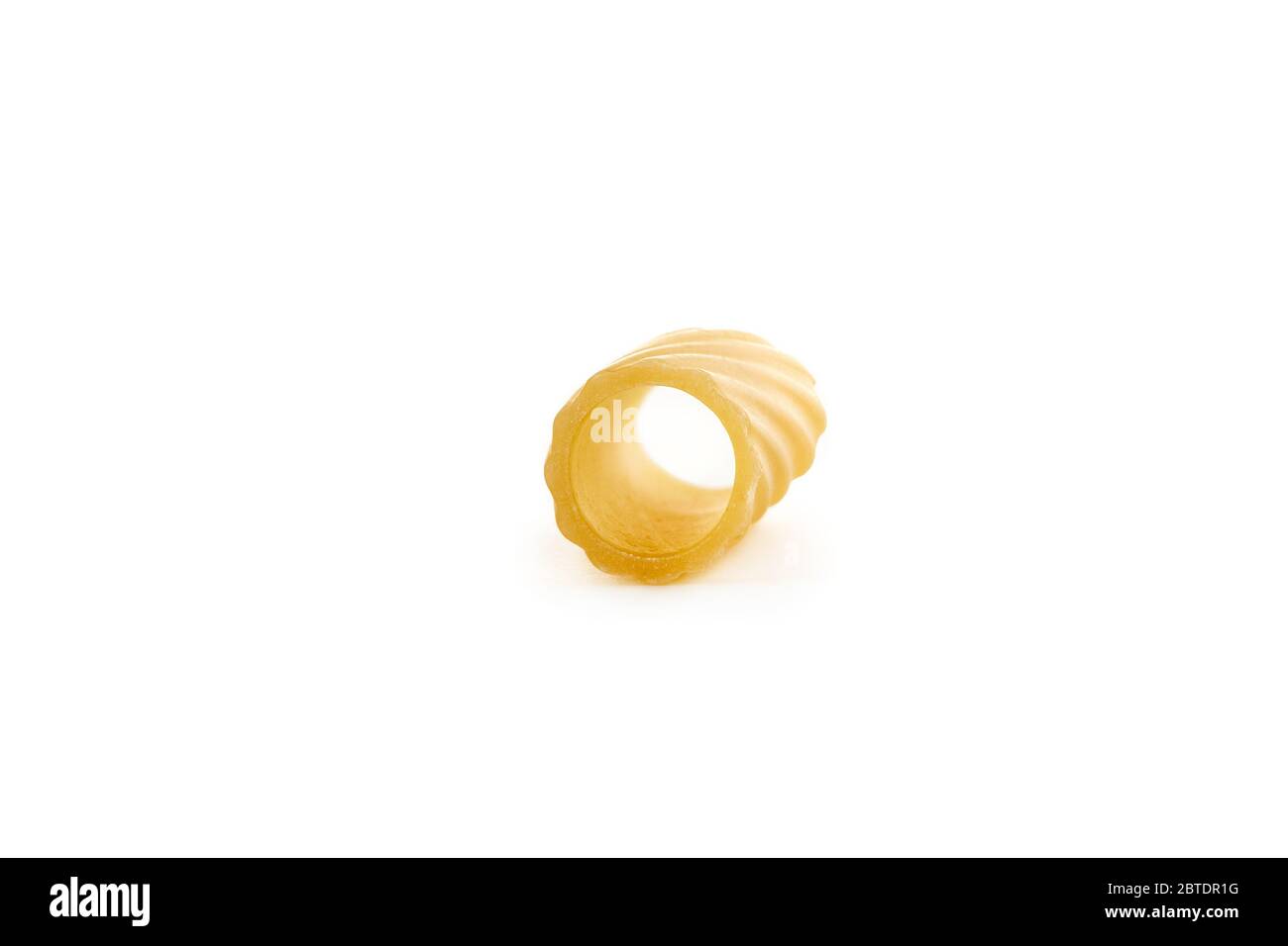 Italian raw dry pasta rigatoni isolated on white background Stock Photo ...