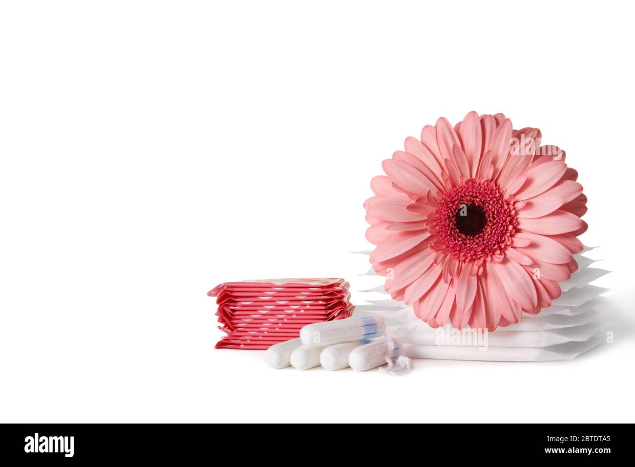 menstrual sanitary pads and cotton tampons on white background ...