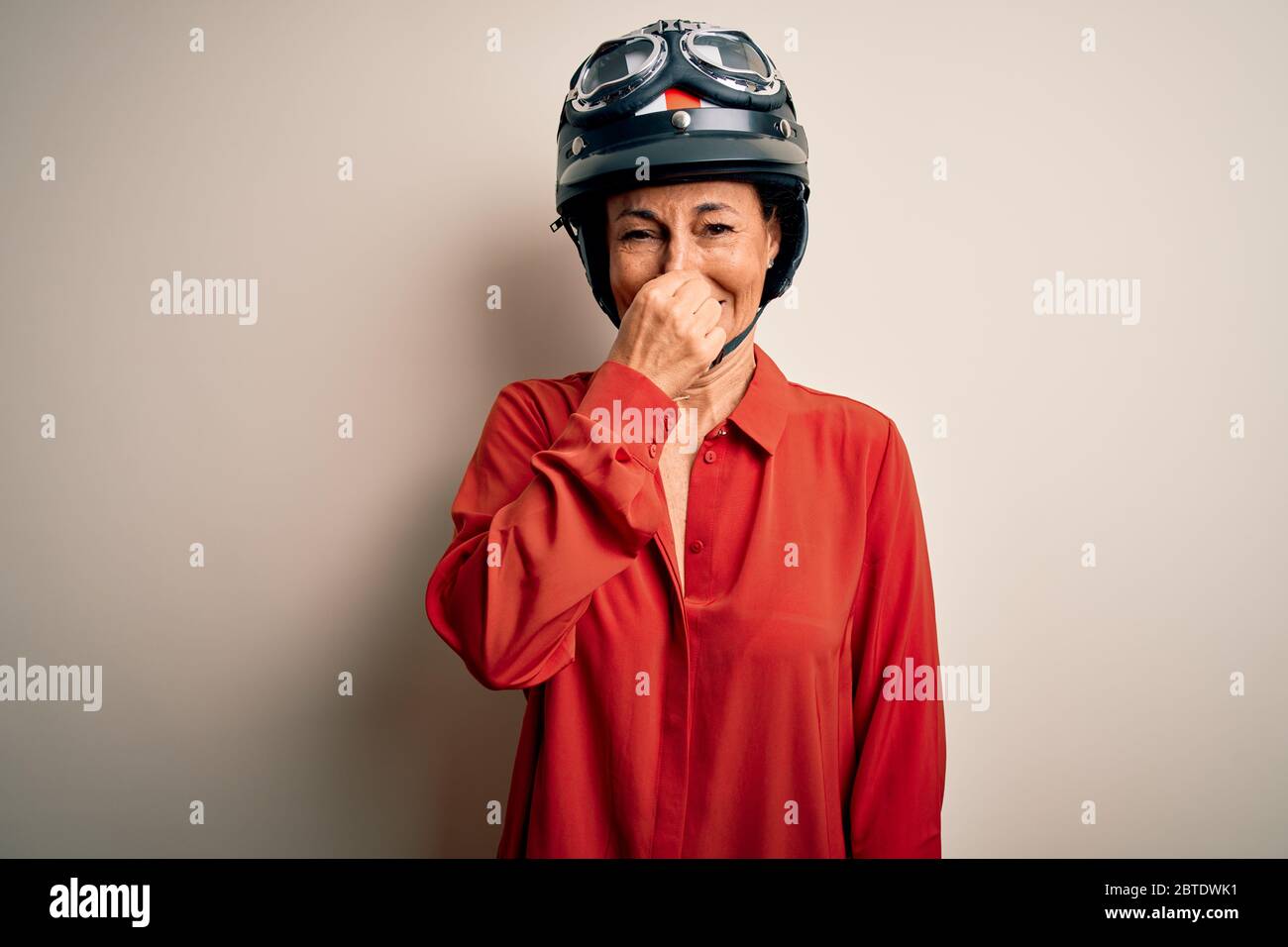 Old woman wearing helmet isolated hi-res stock photography and images ...