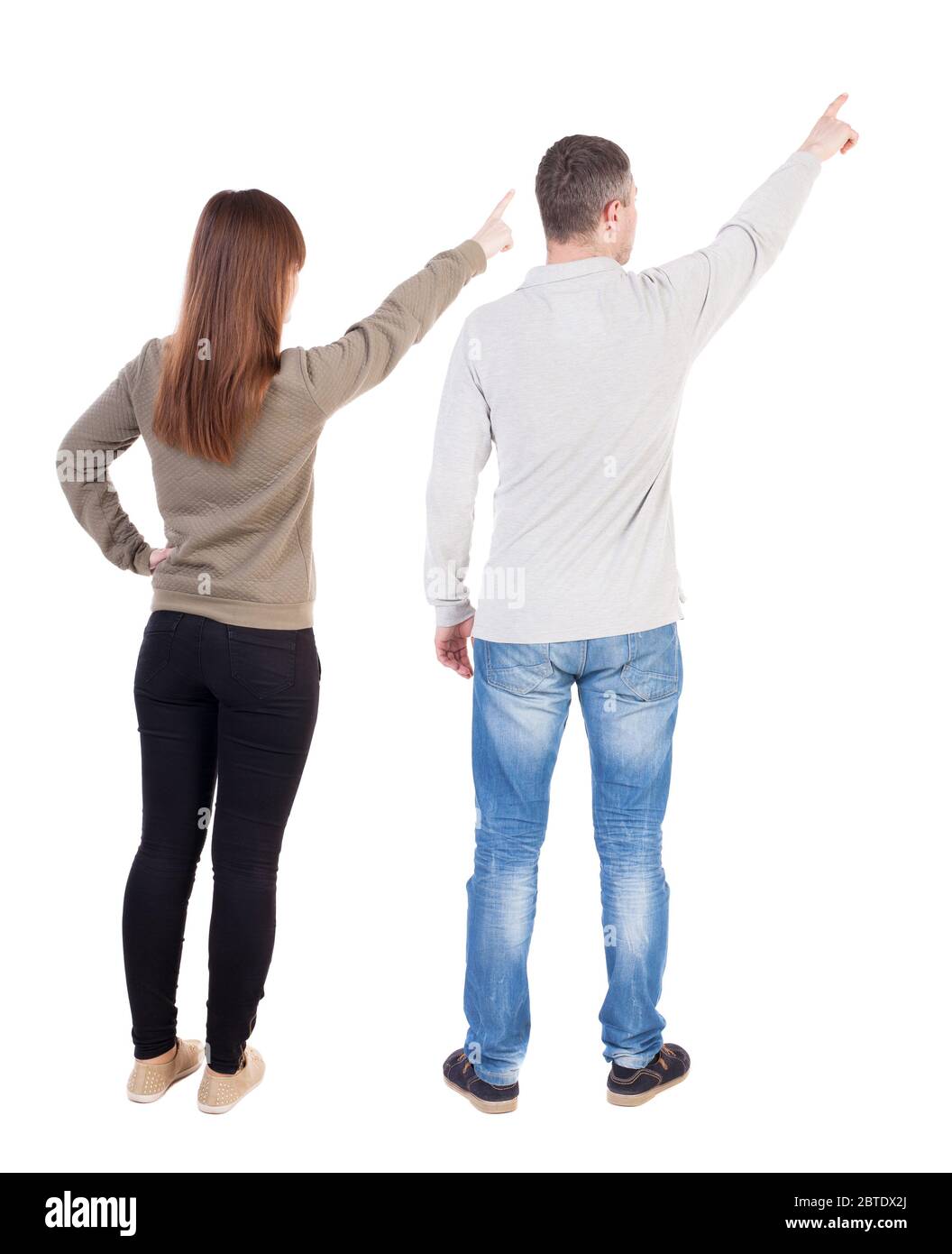 Back view of couple in sweater with mobile phone. beautiful friendly ...
