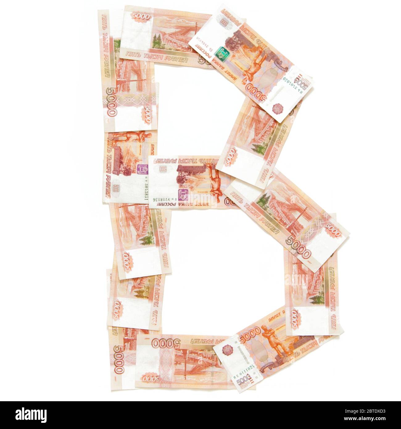 Russian alphabet, lined with Russian money. The letter "В Stock Photo ...