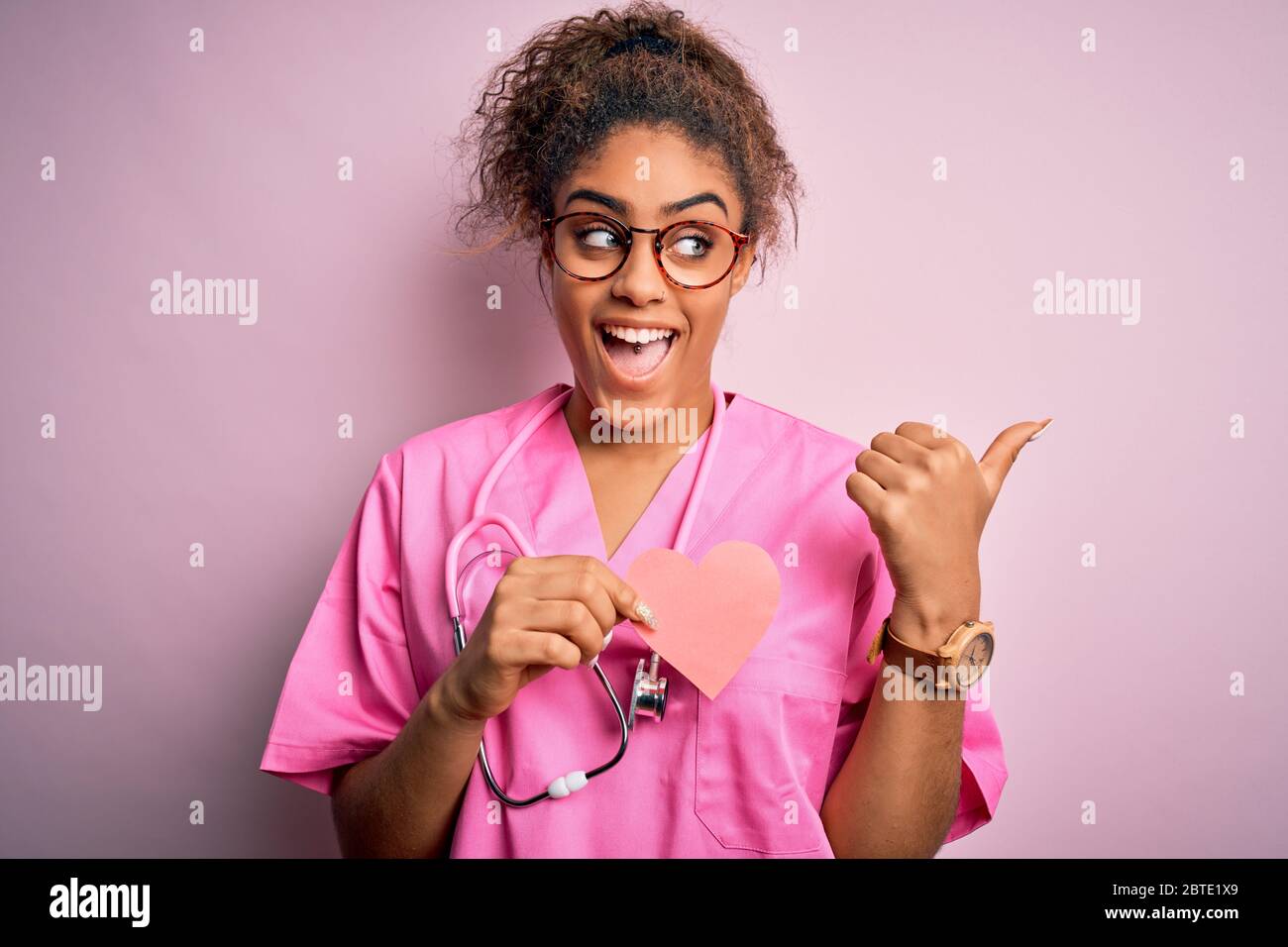 African american cardiologist girl wearing medical uniform and ...