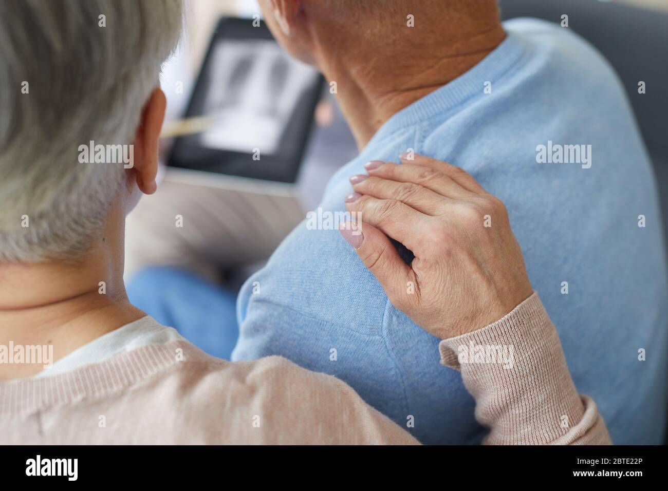Hand shoulder hug hi-res stock photography and images - Alamy