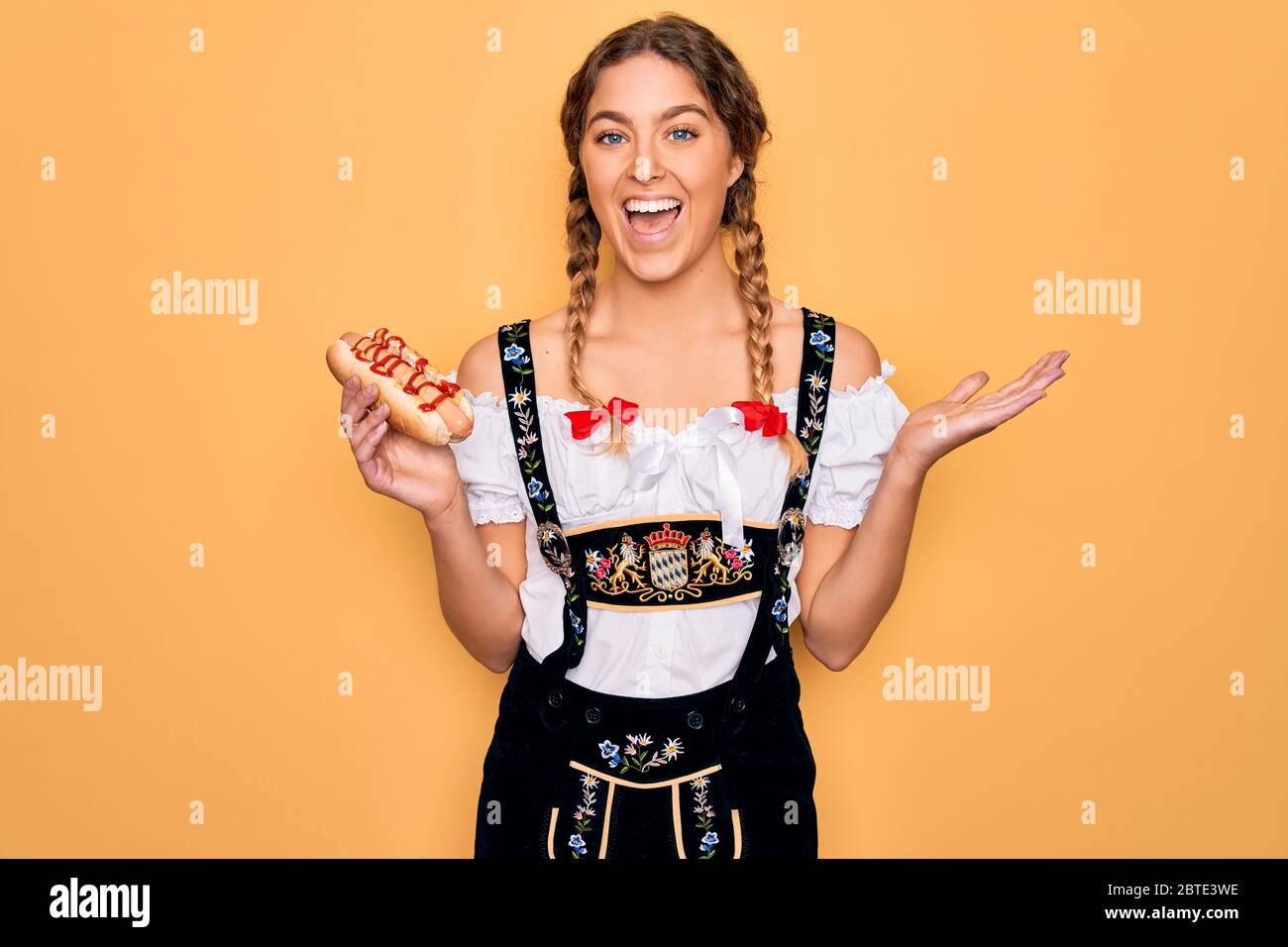 Beautiful blonde german woman with blue eyes wearing oktoberfest dress ...