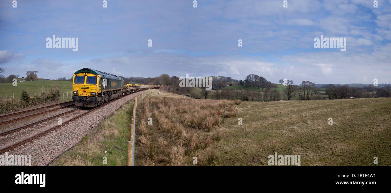 Freightliner class 66 locomotive 66596 passing Borwick on the scenic ...
