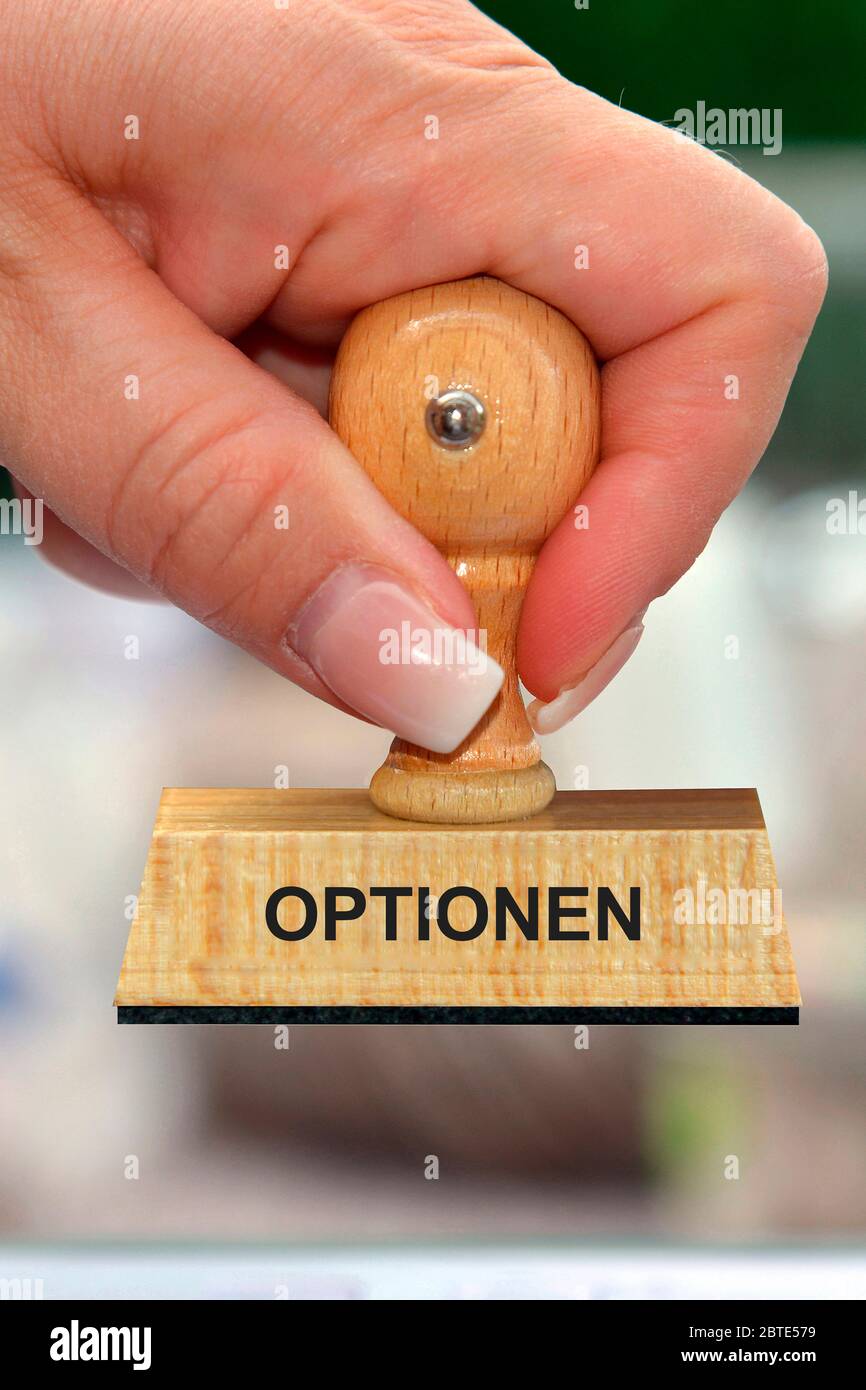 hand with stamp lettering Options Stock Photo - Alamy