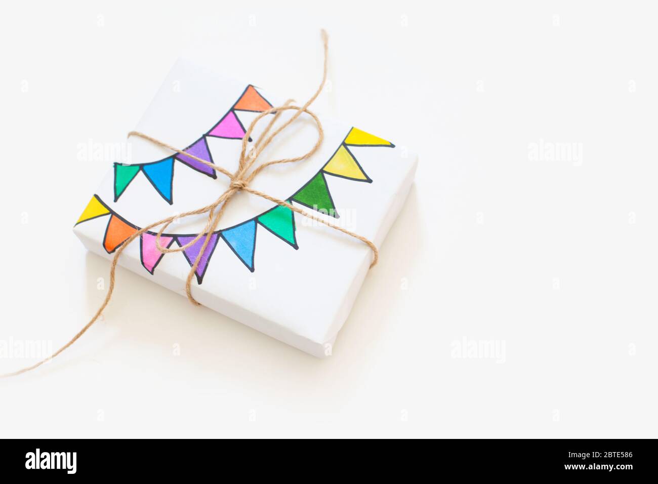 Gift box falling confetti Cut Out Stock Images & Pictures - Alamy