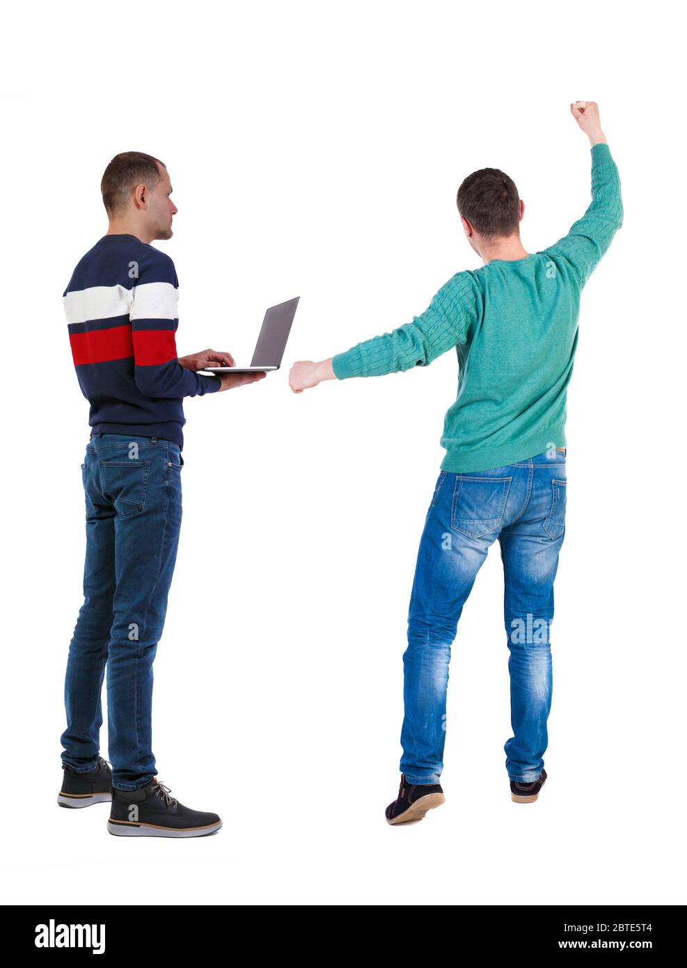 Back view two man in sweater with laptop. Rear view people collection ...