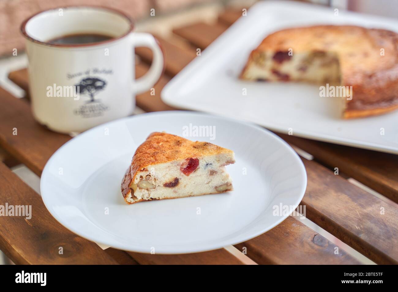 Cottage cheese casserole with raisins and semolina on wooden background ...