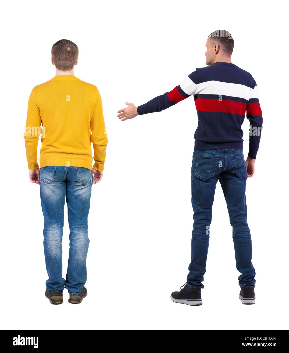 Back view of two man in sweater pointing. Rear view people collection ...