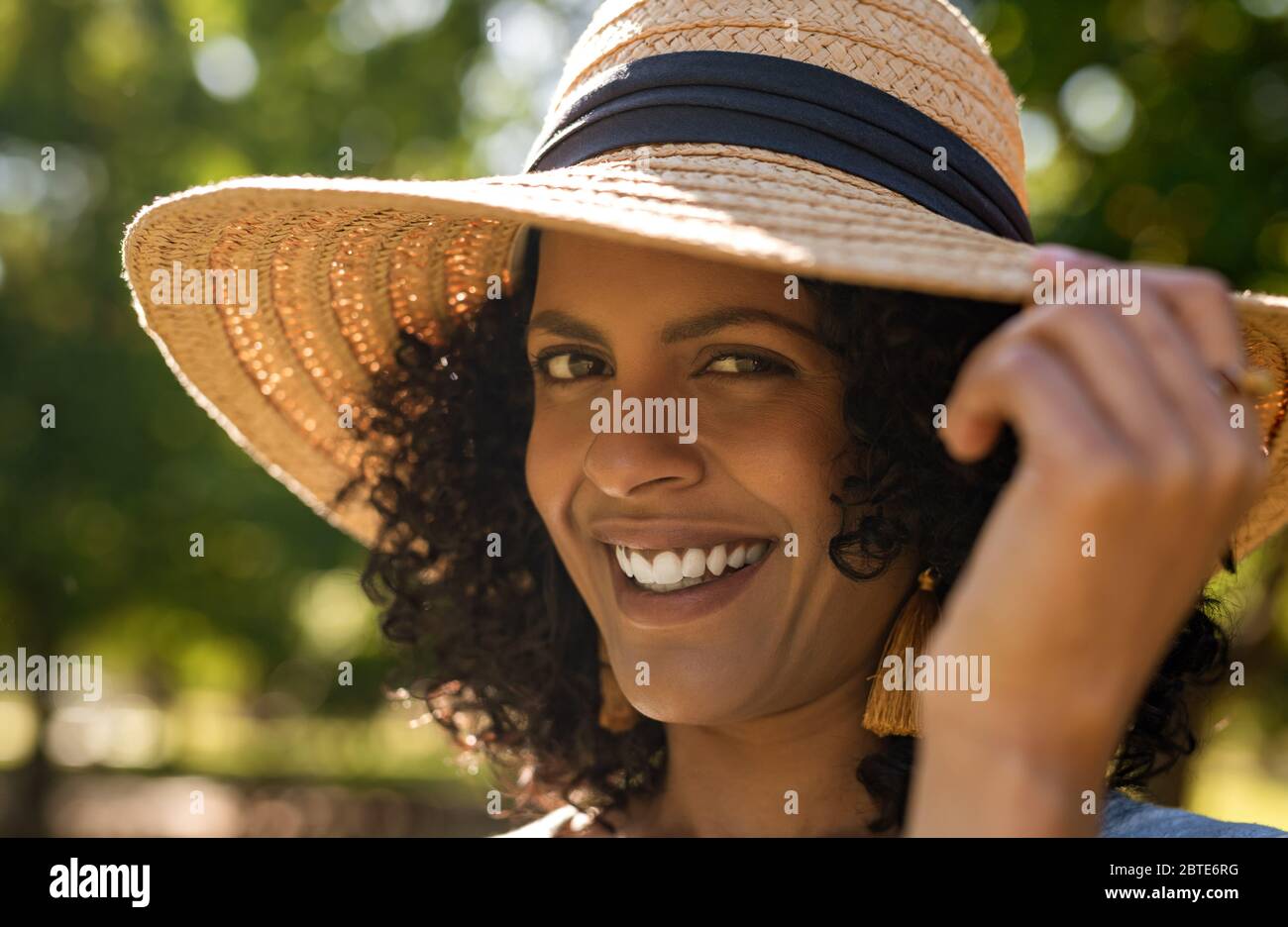 Wearing a sun hat hi-res stock photography and images - Alamy