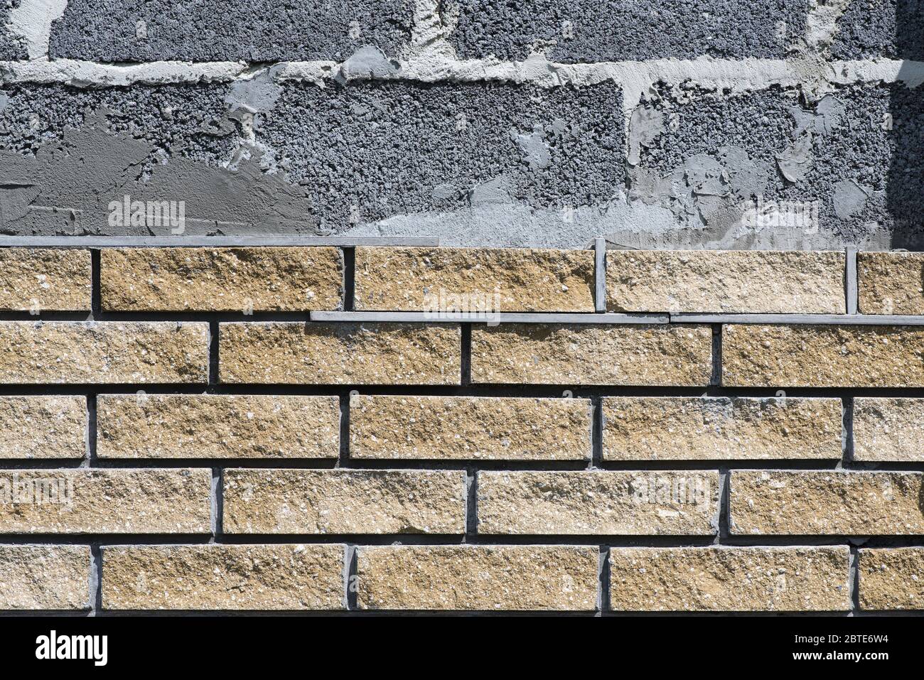 Wall cladding with decorative bricks, front view. Material for ...