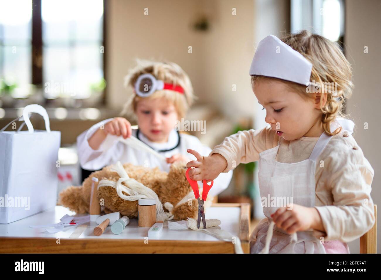 Brother sister playing doctor stethoscope hi-res stock photography and ...