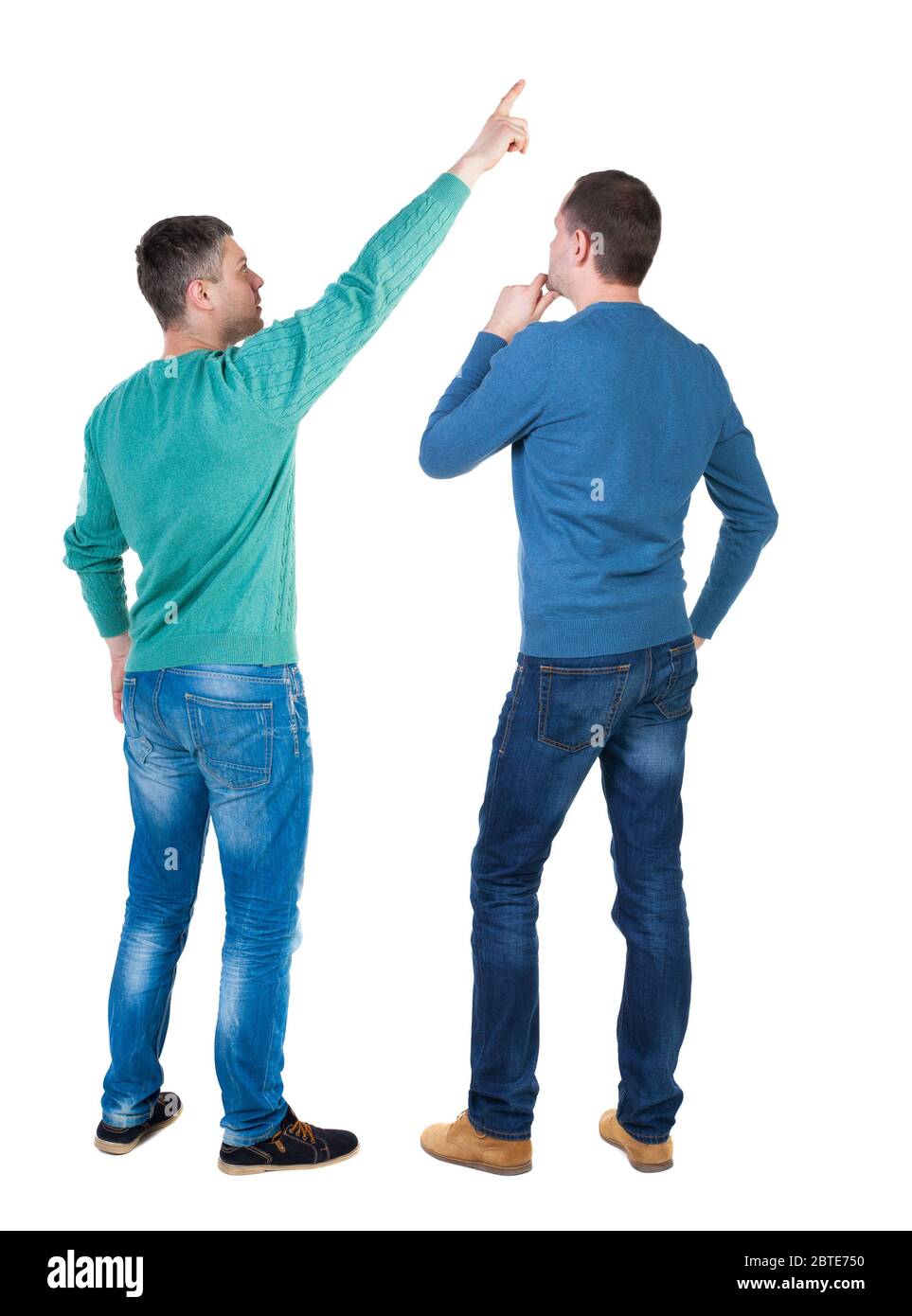 Back view of two man in sweater pointing. Rear view people collection ...