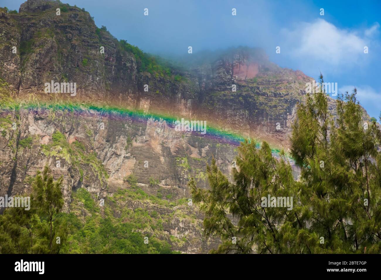 Colorful rainbow and Le Morn brabant mountain in Mauritius Stock Photo ...