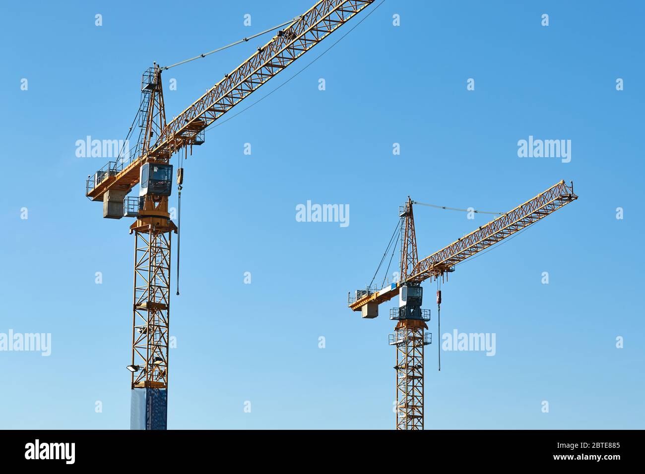 Tall Construction Cranes Stock Photo - Alamy
