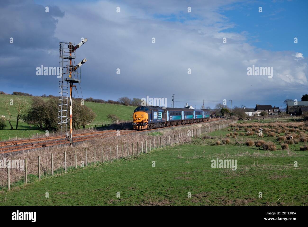Direct Rail Services class 37 37409 hauling a Northern rail train past ...