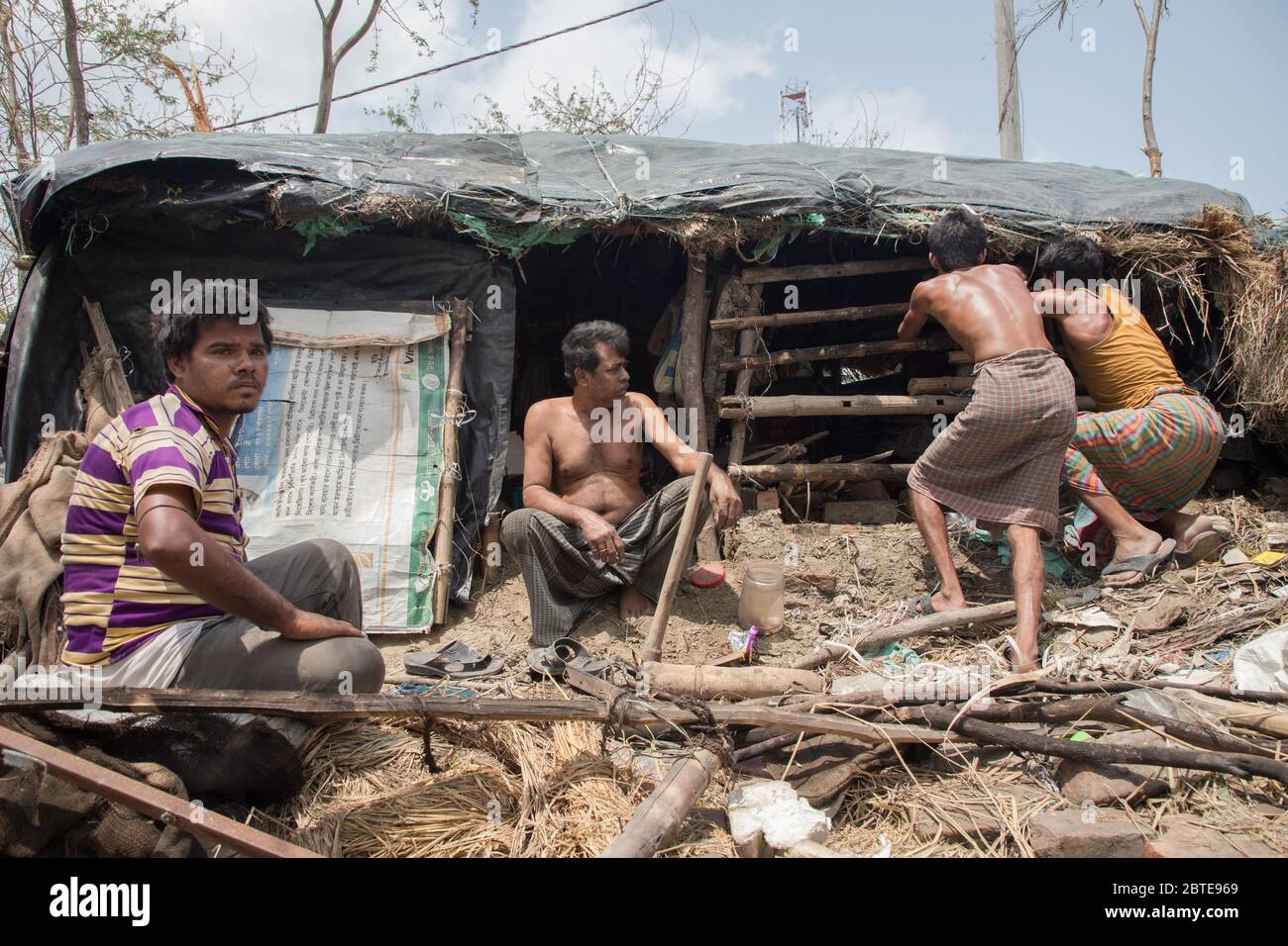Canning, India. 24th May, 2020. Men are trying to repair their broken ...