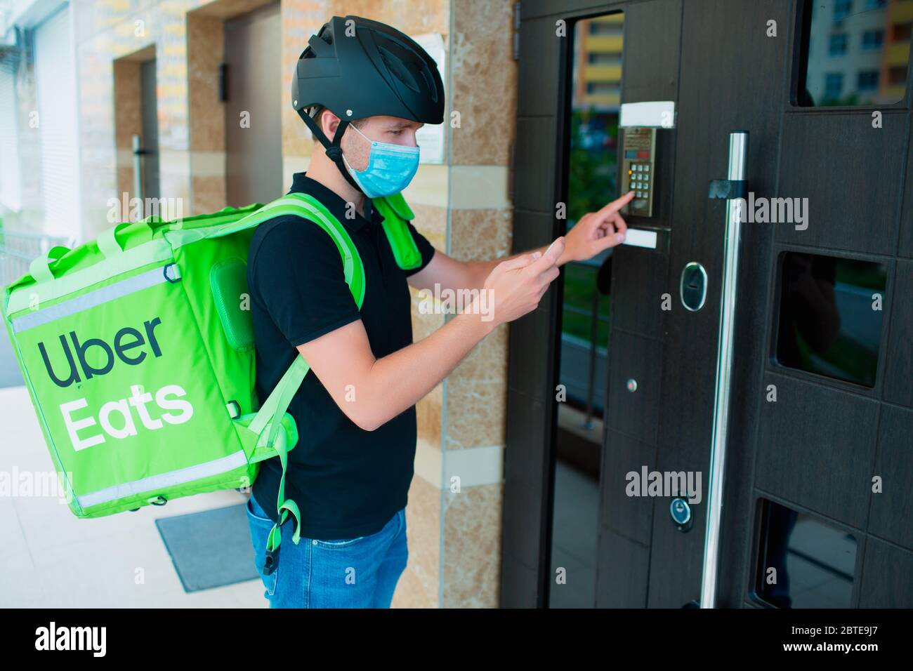 Kyiv, Ukraine - May 06, 2020: The Uber Eats courier. Food delivery ...