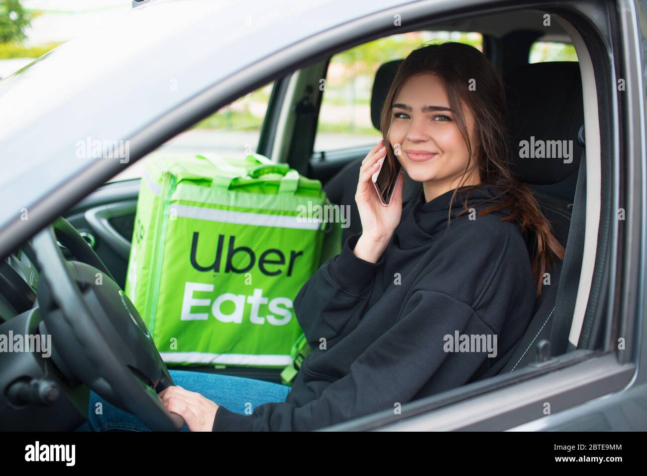 Kyiv, Ukraine - May 06, 2020:The Uber Eats courier. Food delivery ...