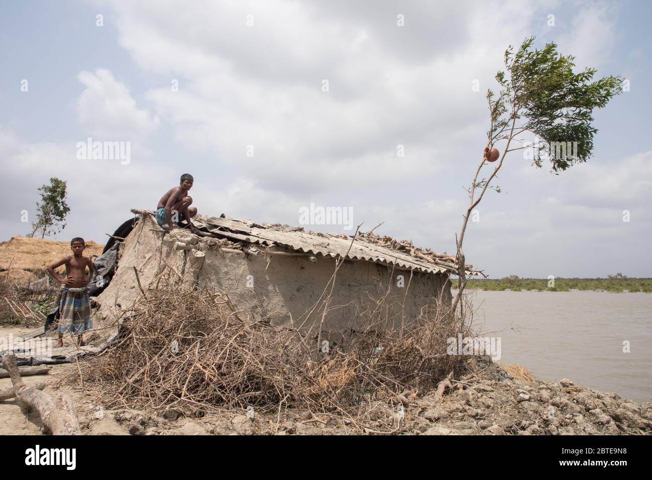Canning, India. 24th May, 2020. Men are trying to repair their broken ...