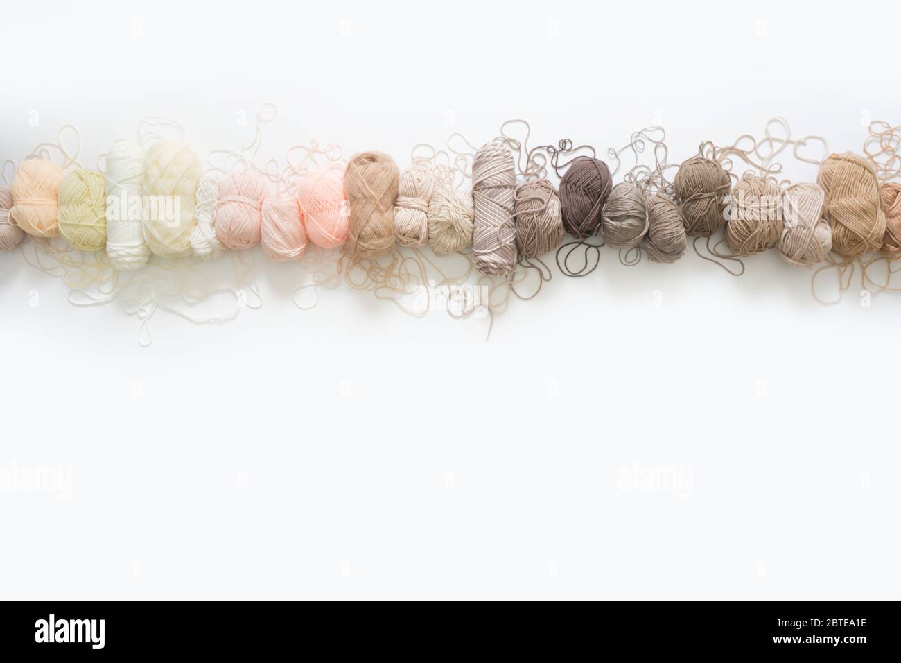 Wool and cotton yarn for knitting of neutral natural color. Background ...