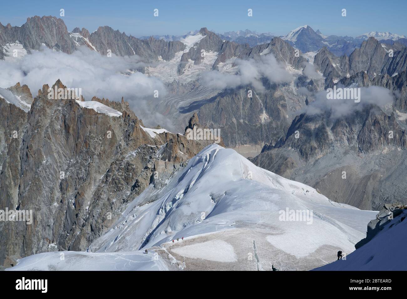 Alpine landscape with high mountains and glaciers. French Alps as seen from the top of Mt ...