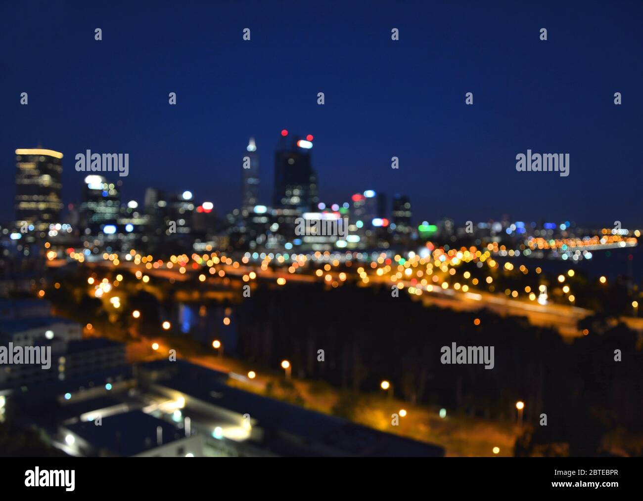 Night city skyline blurred lights of Perth. Bokeh effect Stock Photo ...