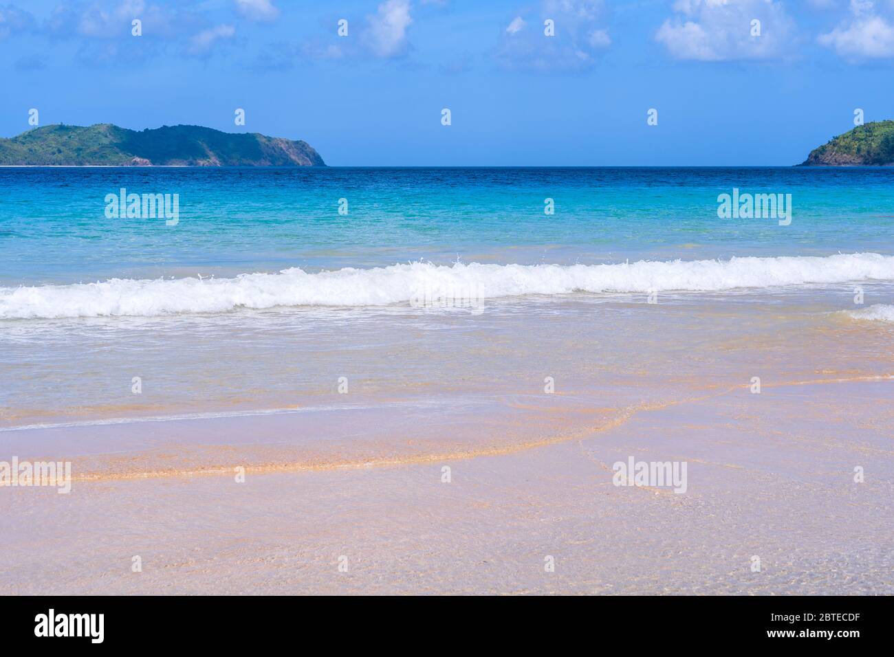 Beautiful amazing gold colored sandy beach with soft waves isolated ...
