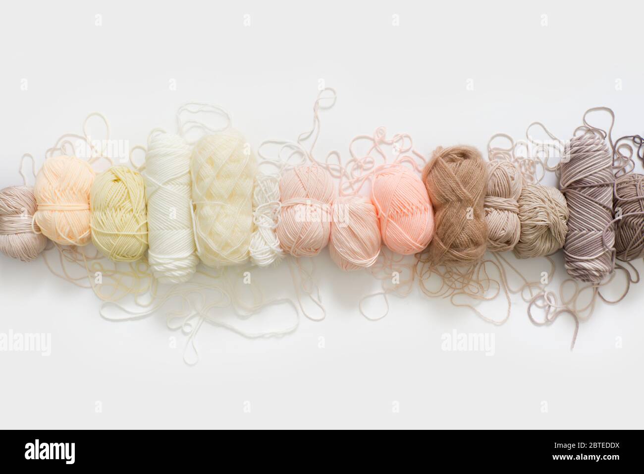 Wool and cotton yarn for knitting of neutral natural color. Background ...
