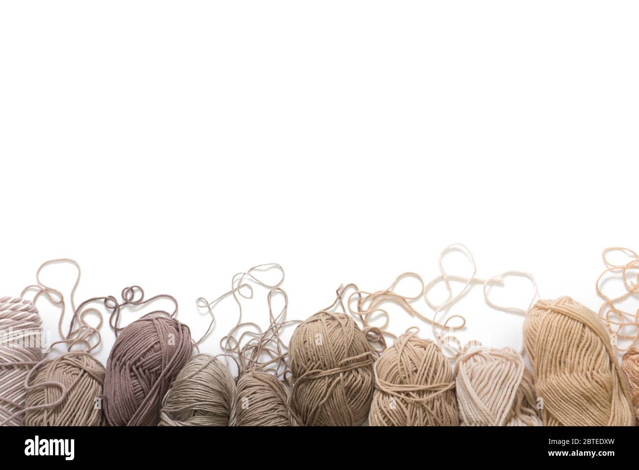 Wool and cotton yarn for knitting of neutral natural color. Background ...