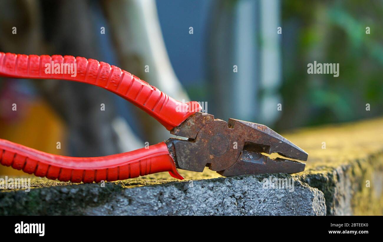 Close up of the red pliers Stock Photo - Alamy