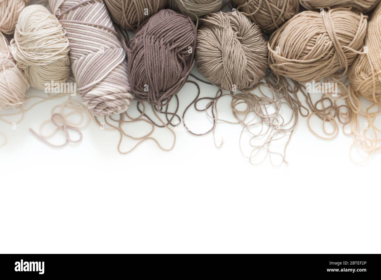 Wool and cotton yarn for knitting of neutral natural color. Background ...