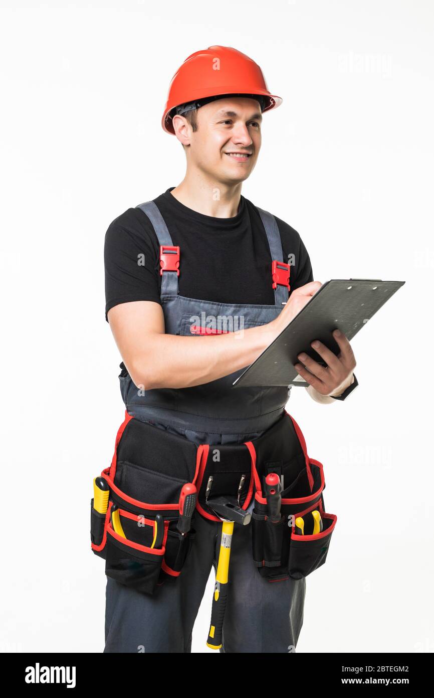 Full length portrait of a male builder over white wall background Stock ...