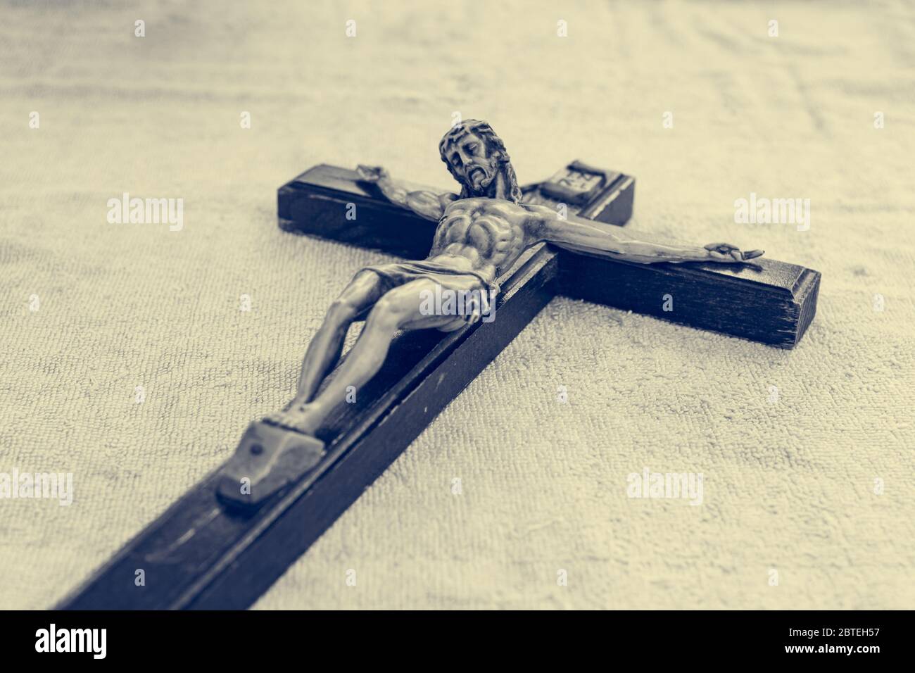 Hand size crucifix - Jesus on wooden cross relic Stock Photo - Alamy