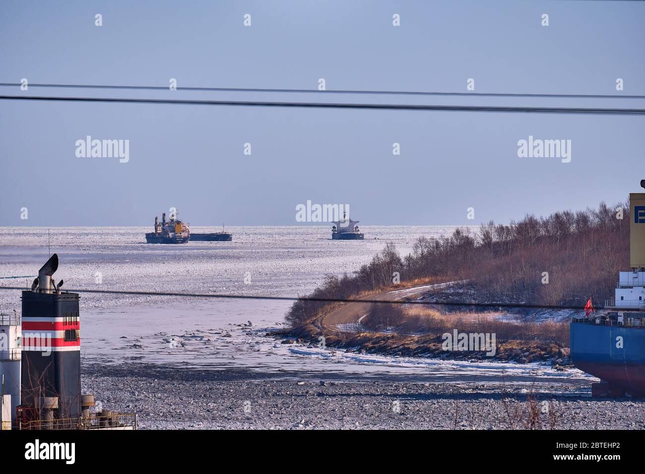 Ships in the port of Vanino Stock Photo - Alamy