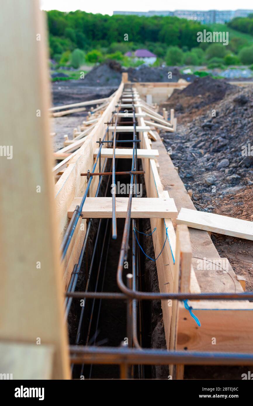 Reinforcement of corners for creating strip foundation for new house ...