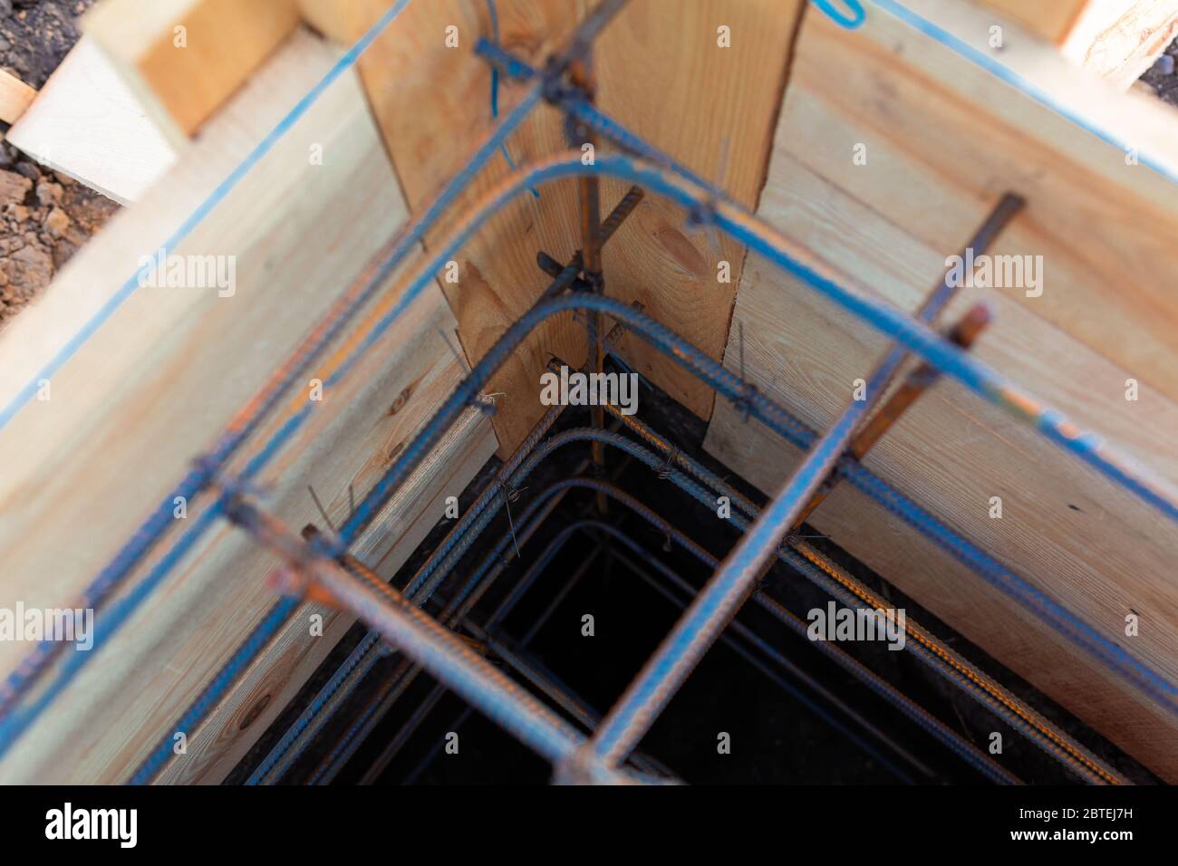 Reinforcement of corners for creating strip foundation for new house ...