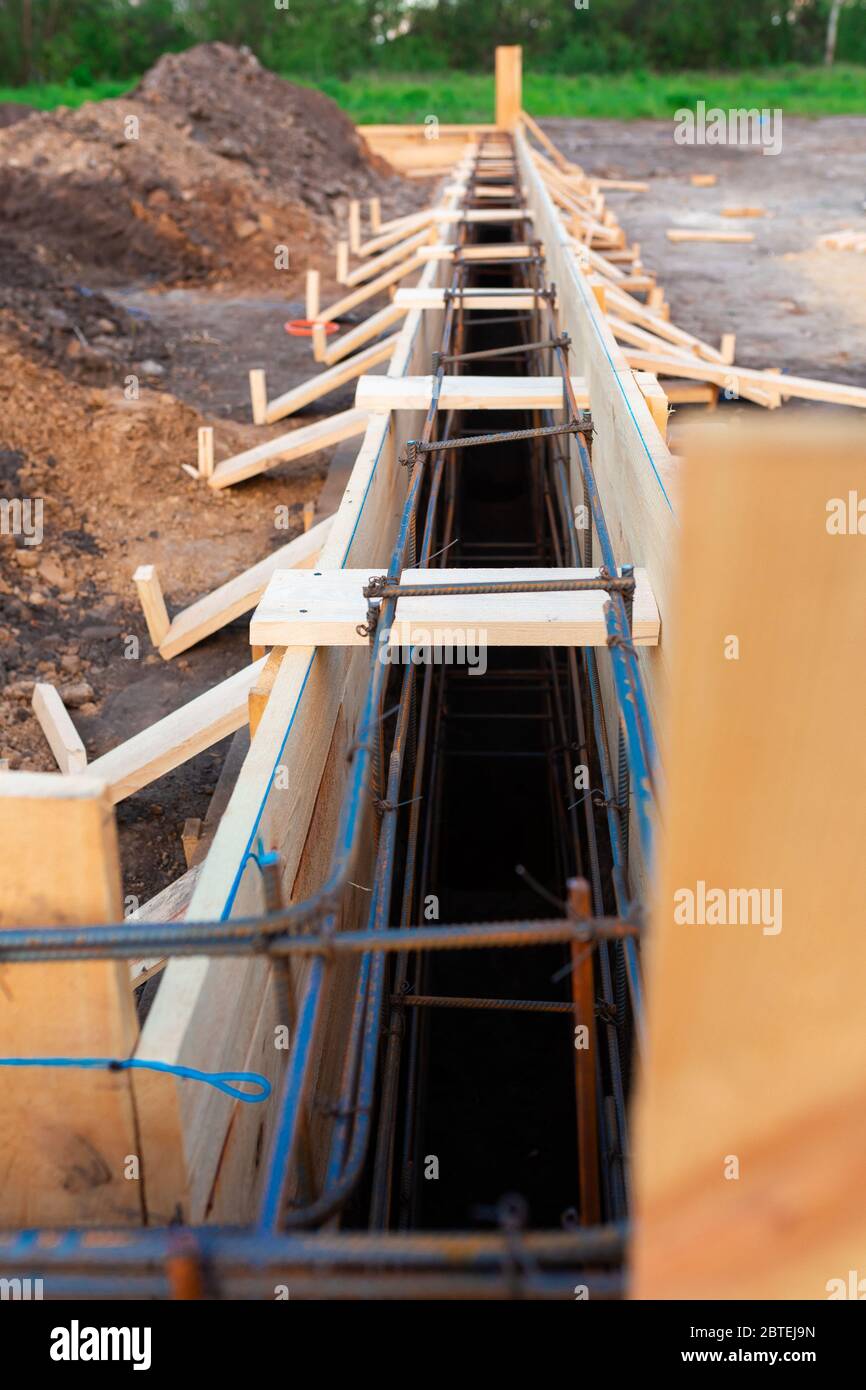 Reinforcement of corners for creating strip foundation for new house ...