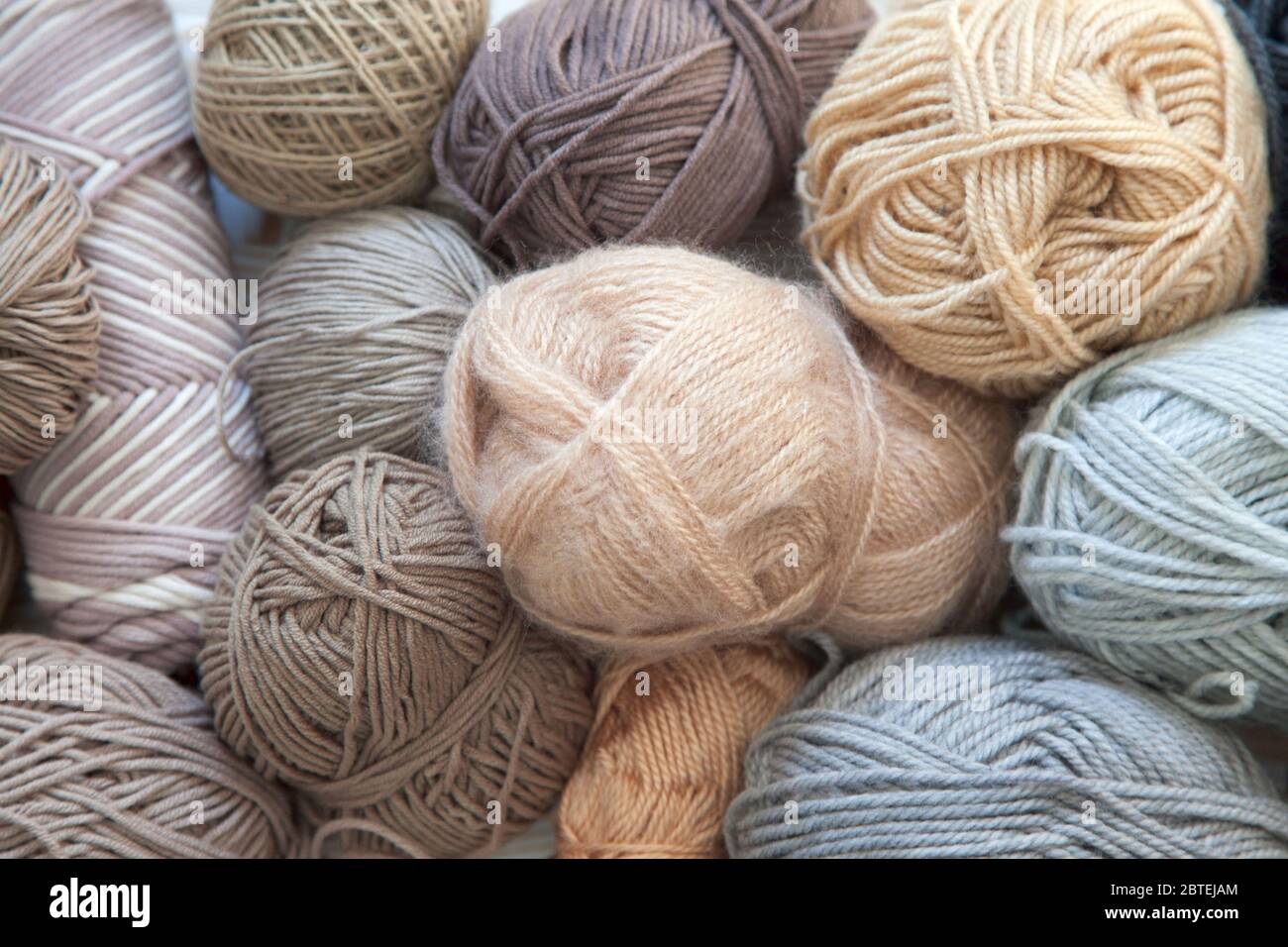 Wool and cotton yarn for knitting of neutral natural color. Background ...