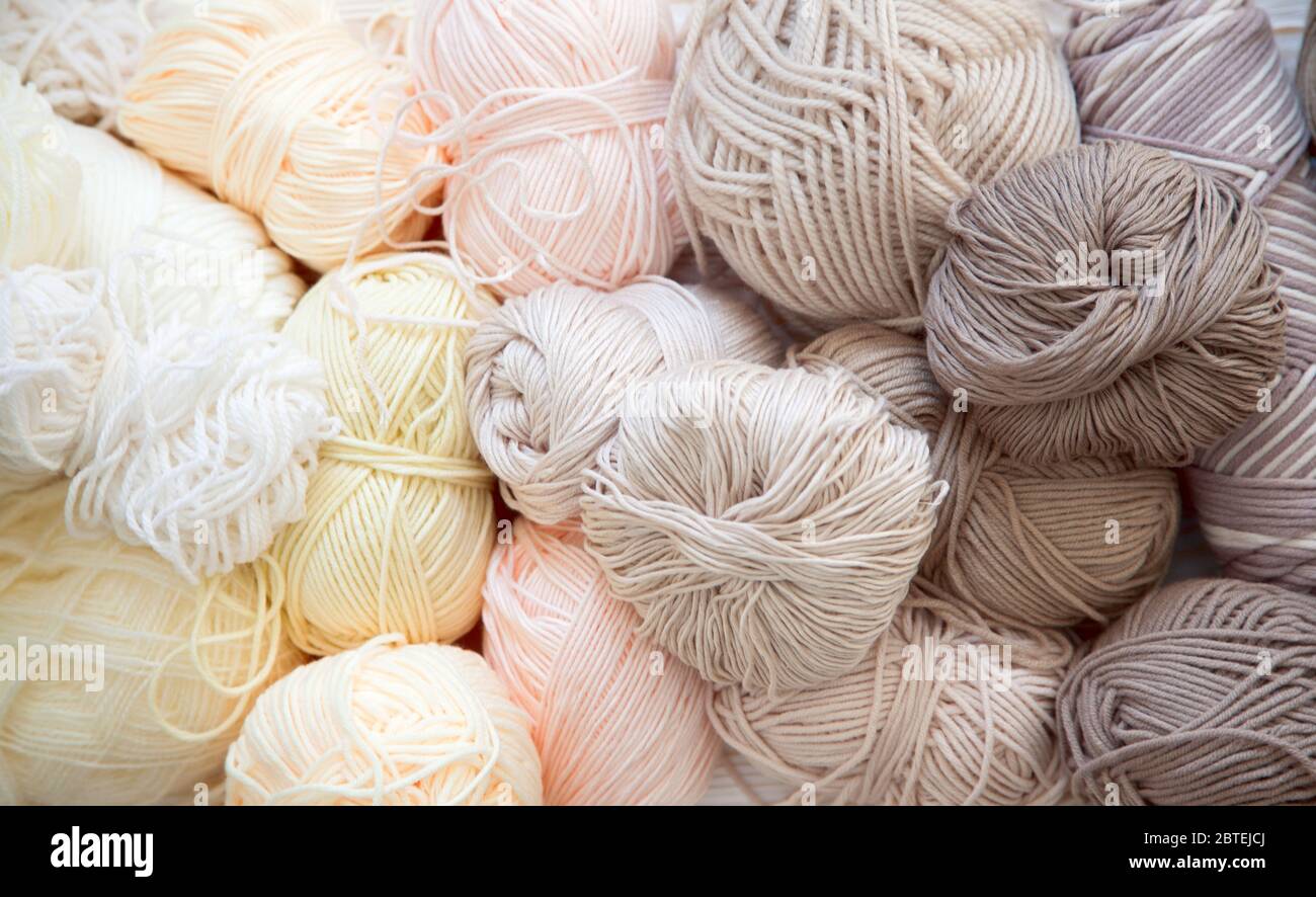 Wool and cotton yarn for knitting of neutral natural color. Background ...