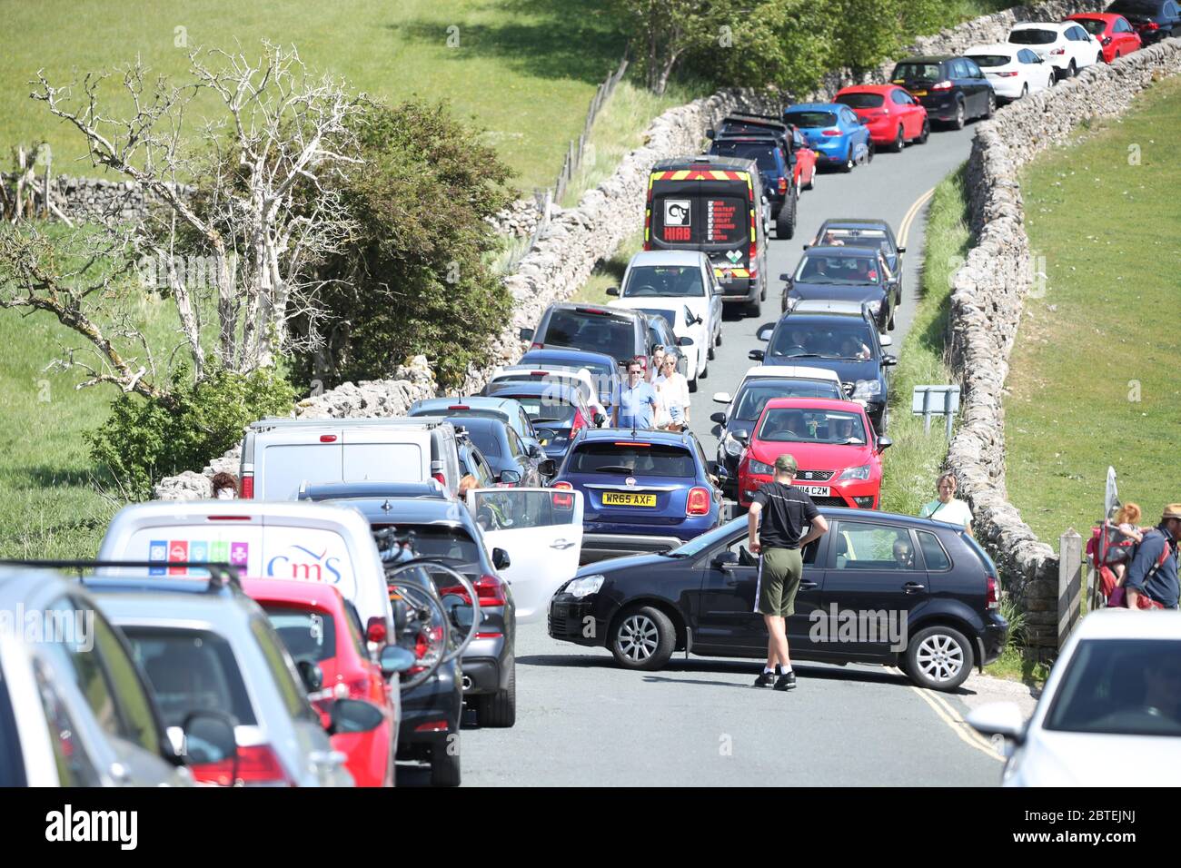Gridlock stretches on a road in Burnsall in the Yorkshire Dales, as ...