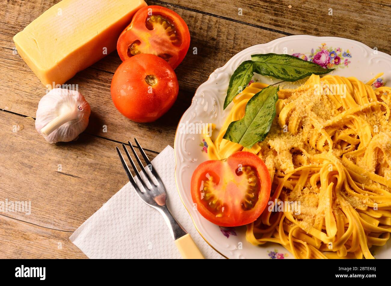 Pasta, typical italian food on the plate Stock Photo - Alamy