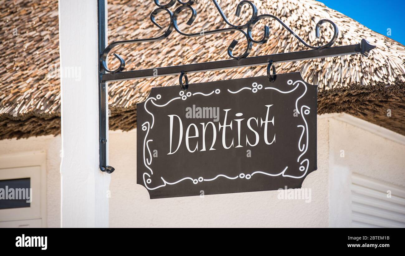 Street Sign the Direction Way to Dentist Stock Photo - Alamy