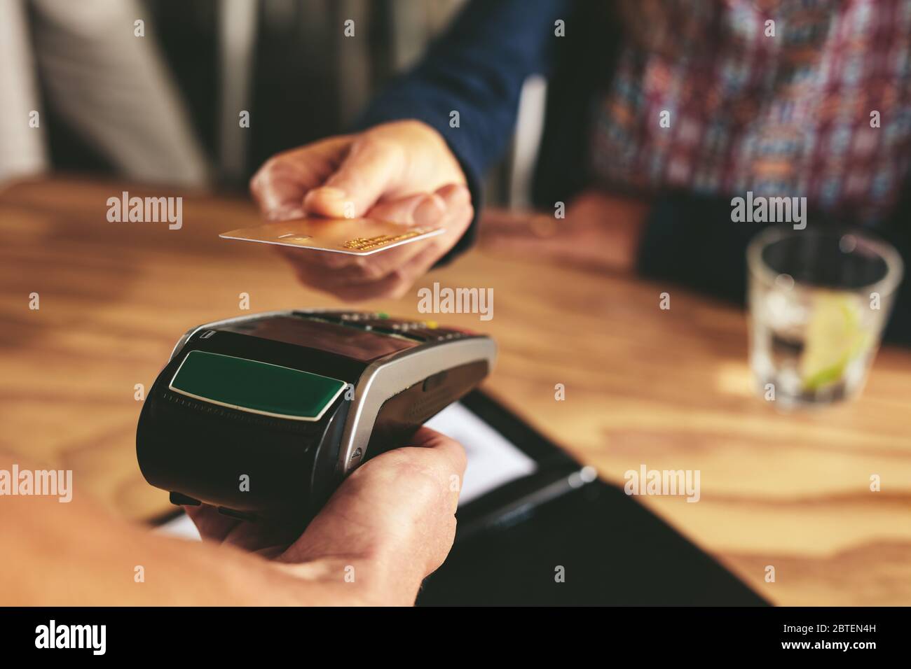 Senior woman cashier counter hi-res stock photography and images - Alamy