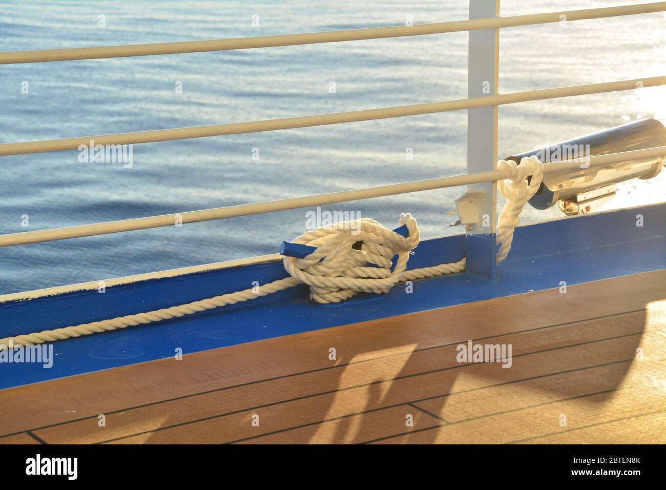 Tied rope. Cruise ship open deck Stock Photo - Alamy