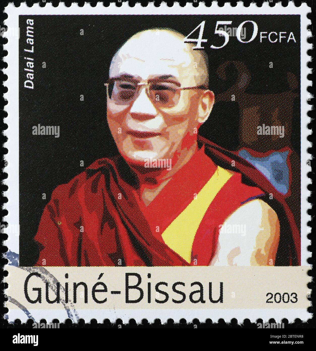 Dalai Lama on postage stamp of Guinea Bissau Stock Photo - Alamy