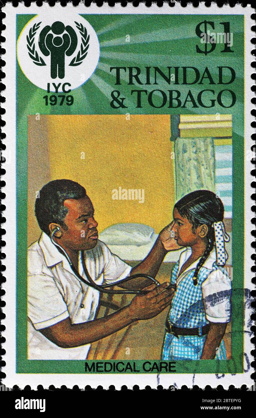 Medical care for children on postage stamp Stock Photo - Alamy